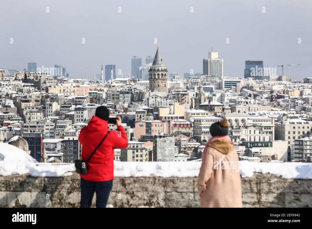 Istanbul, Turkey. 17th Feb, 2021. People seen taking photos in the snow ...