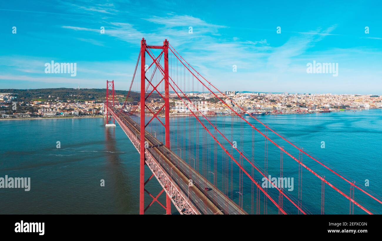 Drone photo of red 25 De Abril bridge in Lisbon, Portugal sightseeing ...