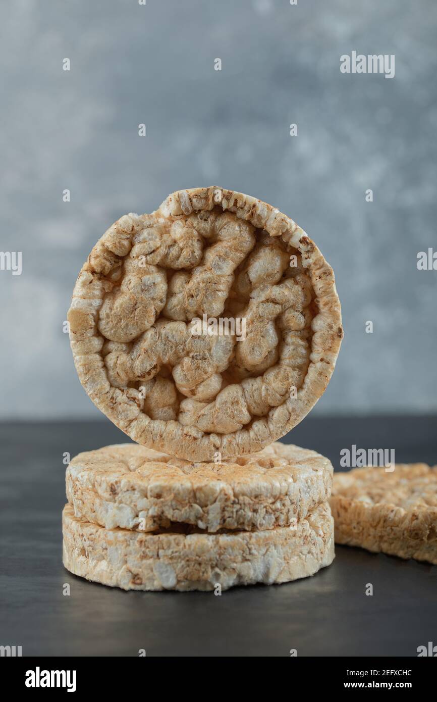 Pile of puffed rice cakes on marble background Stock Photo - Alamy