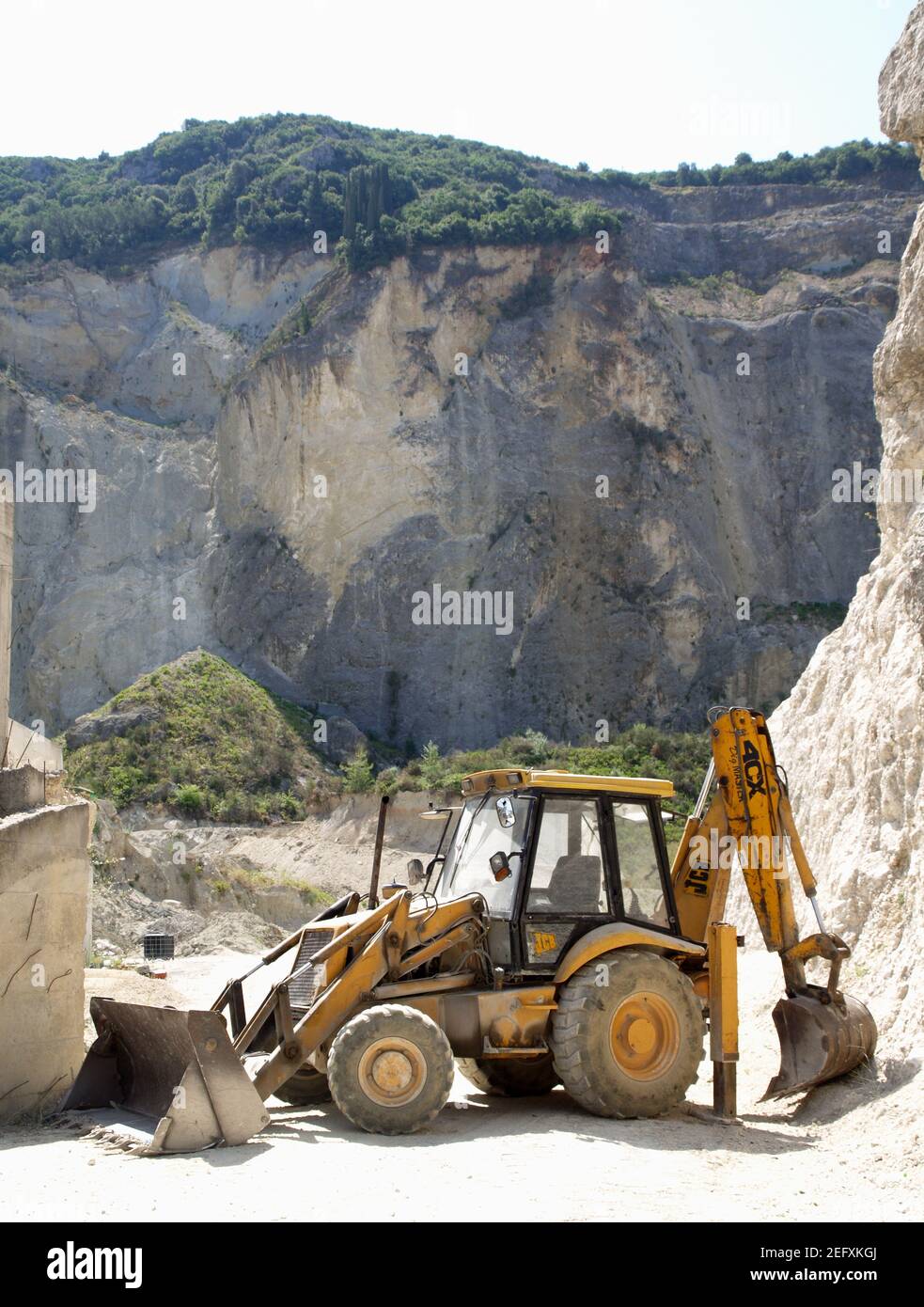 JCB digger at quarry at Troumpeta, Corfu, Greece Stock Photo - Alamy
