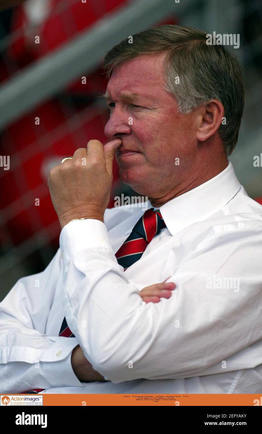 Manchester united manager sir alex ferguson on the bench hi-res stock ...