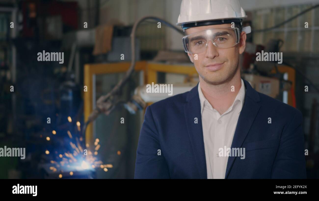 Professional confident engineer businessman in suits safety hats ...