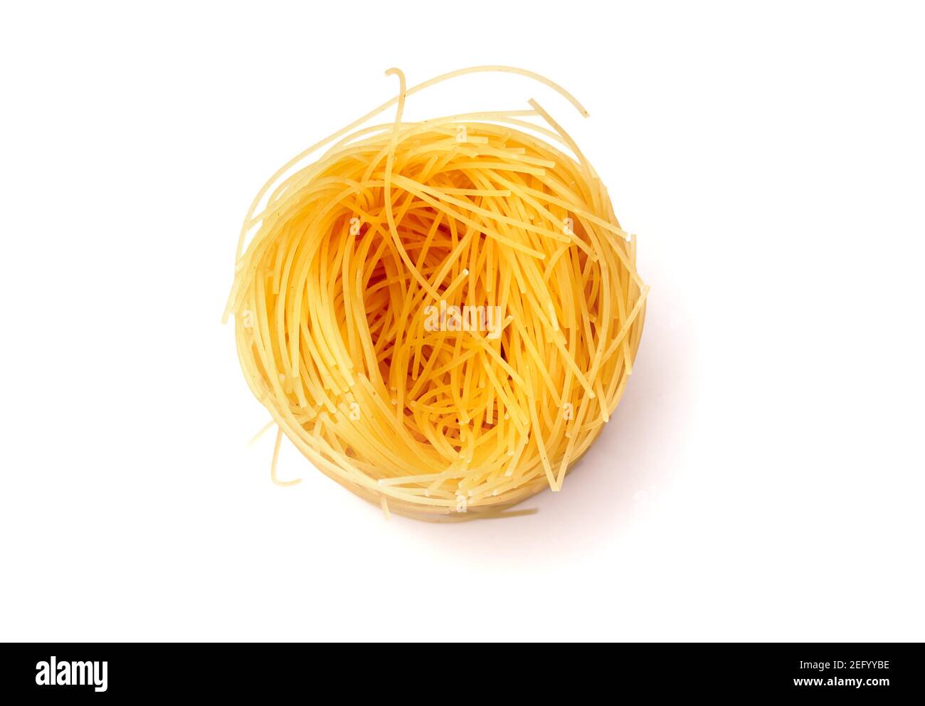 Italian egg pasta nest isolated on white background Stock Photo - Alamy