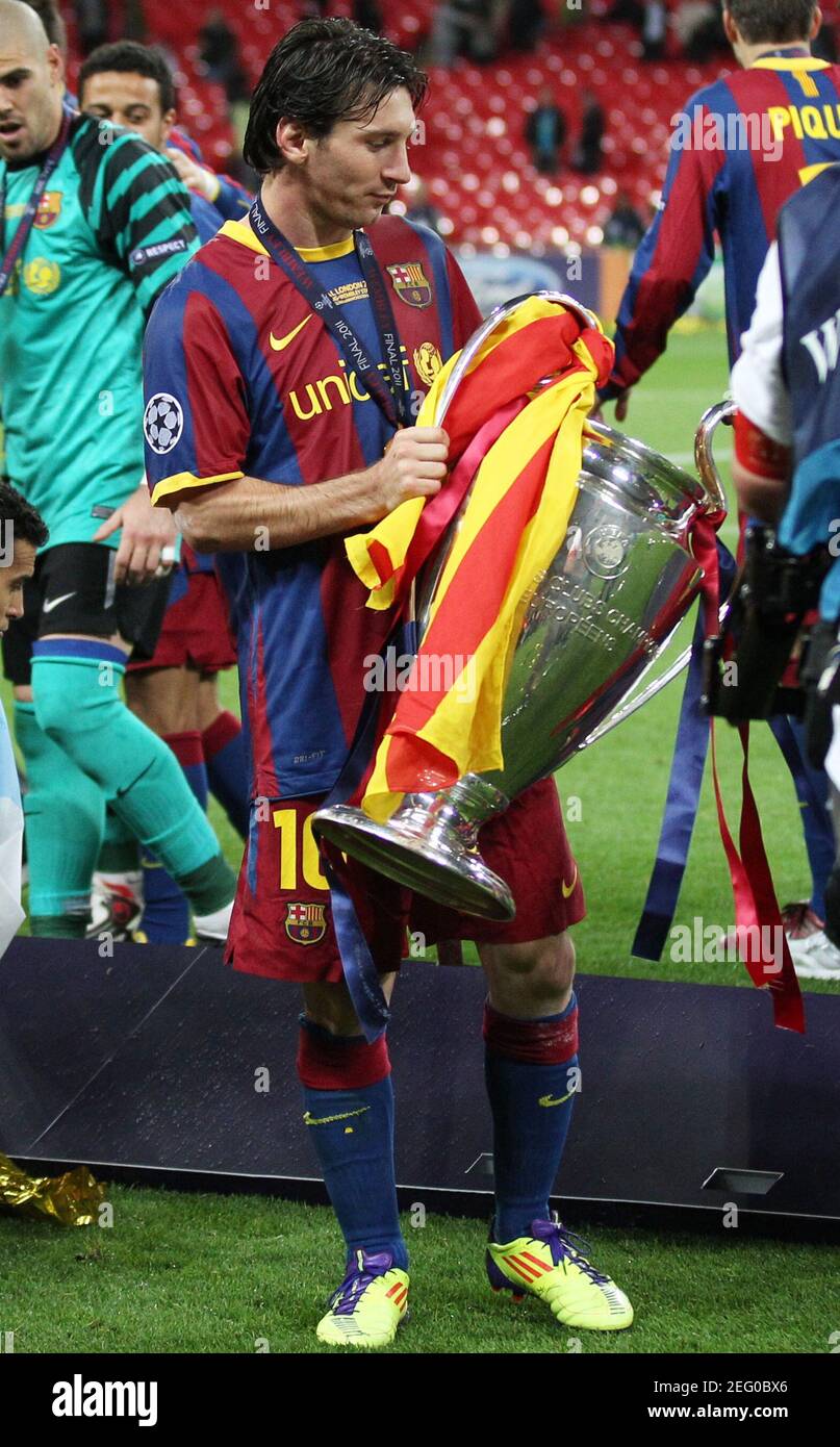 Barcelonas lionel messi celebrates winning the uefa champions league hi ...