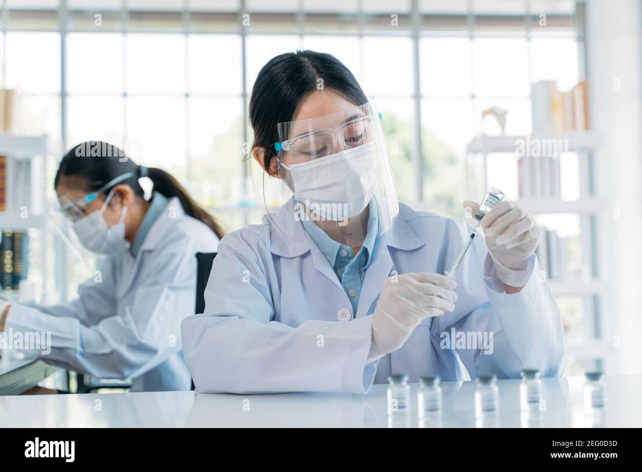 Face young female scientist hi-res stock photography and images - Alamy