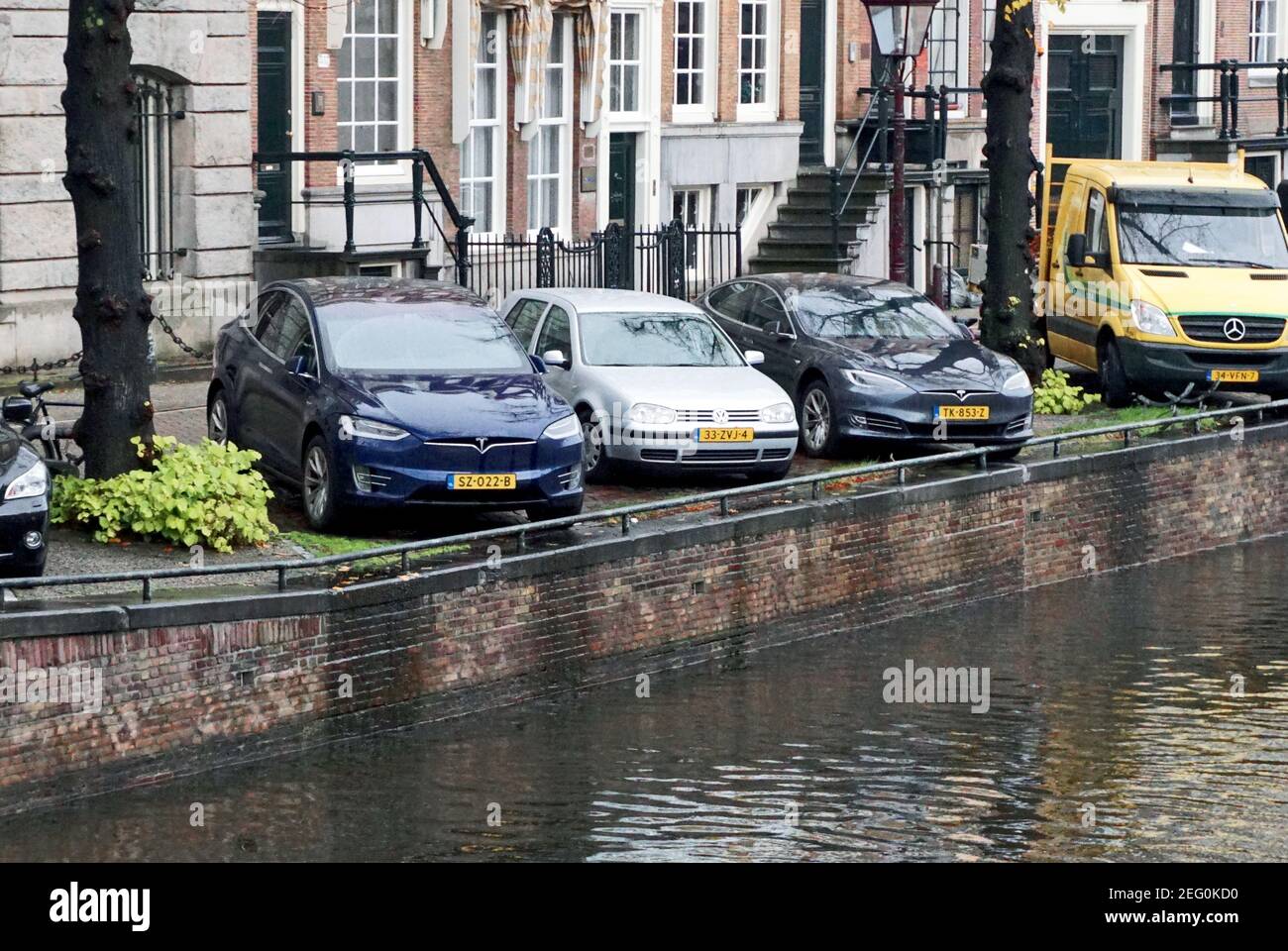 Tesla electric car parked beside the Amsterdam Canal, Netherlands Stock ...