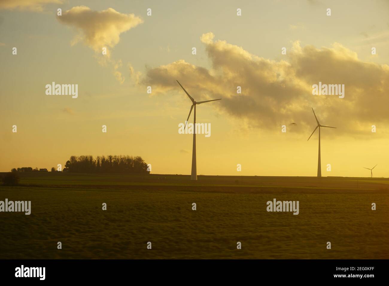Windmill with sunrise sky Stock Photo - Alamy