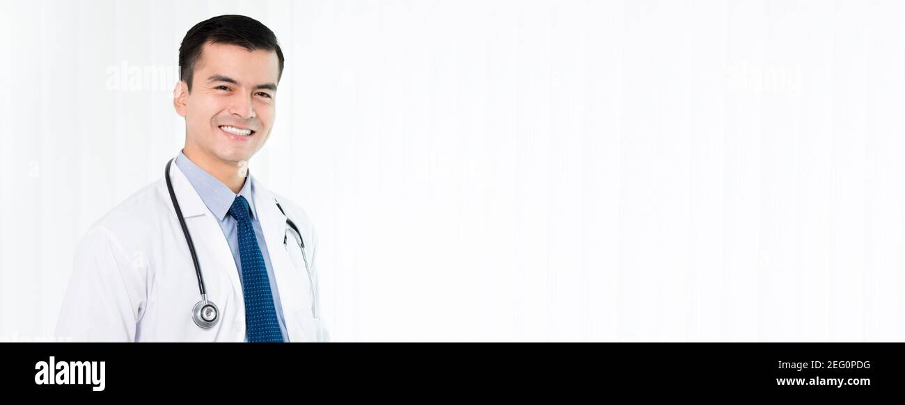 Smiling doctor on white vertical blind background - panoramic banner ...