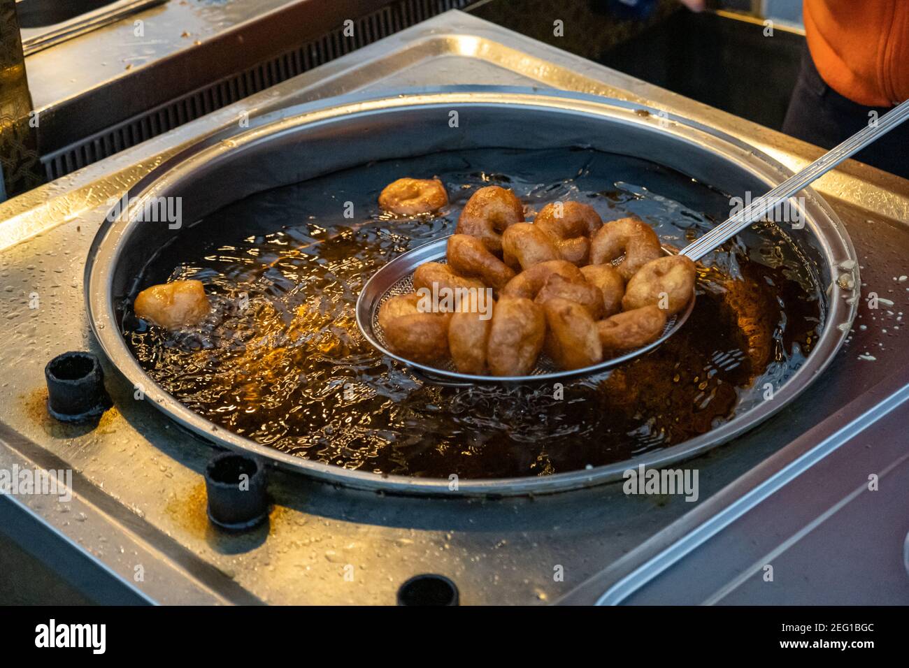 Traditional Turkish dessert. It is called "Lokma". Delicious and ...