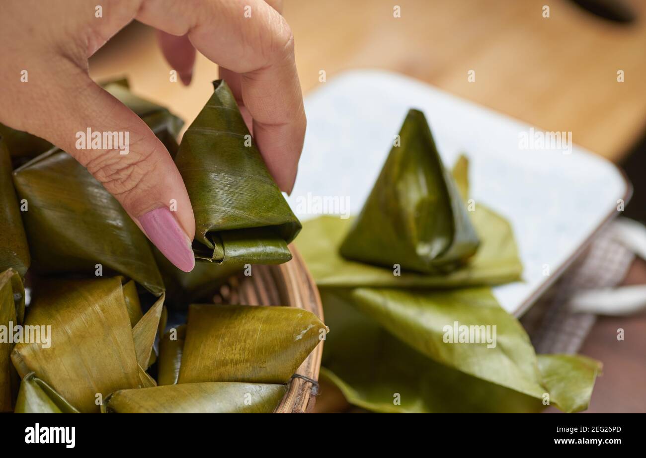 The traditional desserts wrapped in banana leaf Stock Photo - Alamy