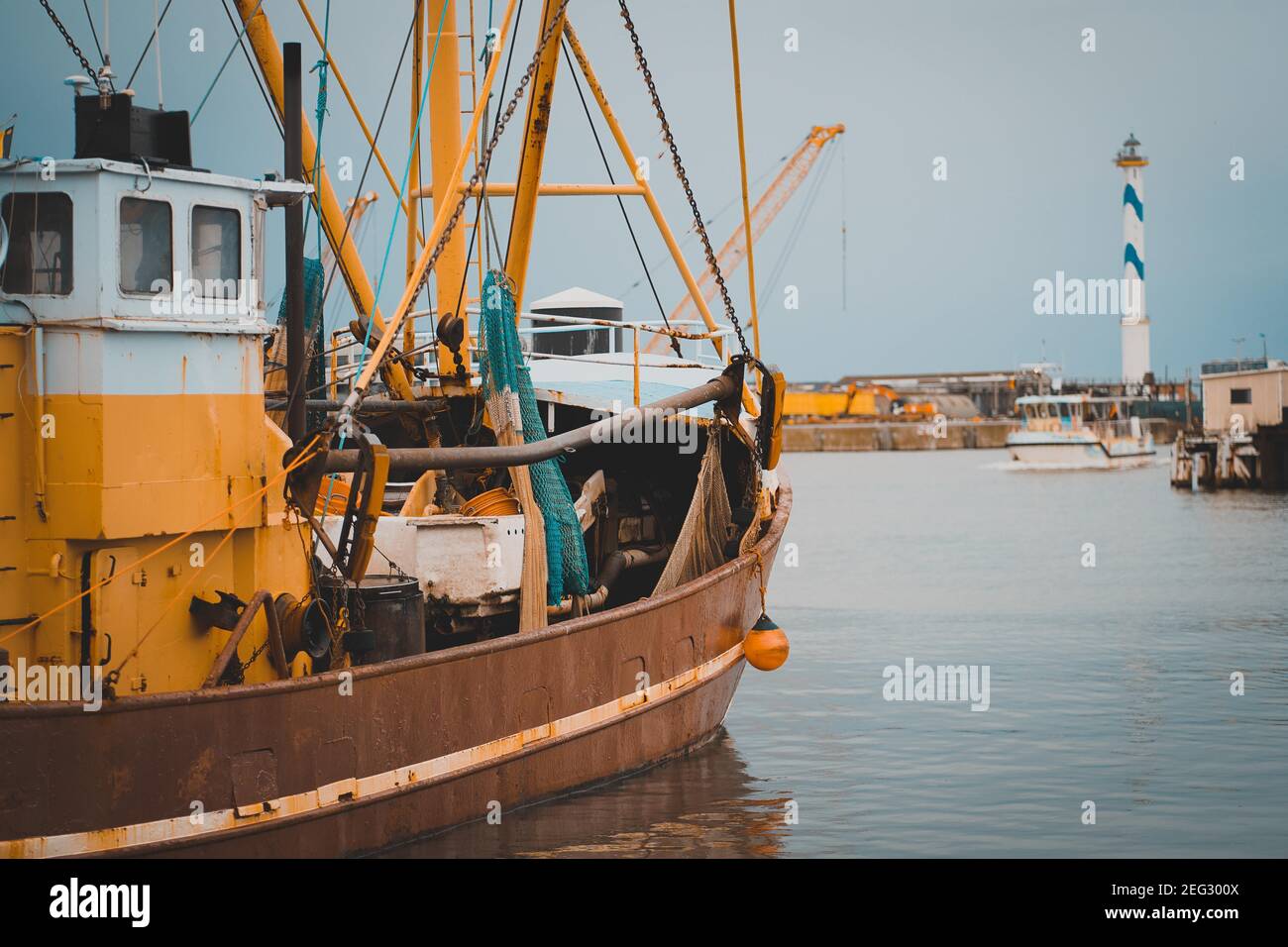 Beautiful view of rusty old trawler boat on the sea Stock Photo - Alamy