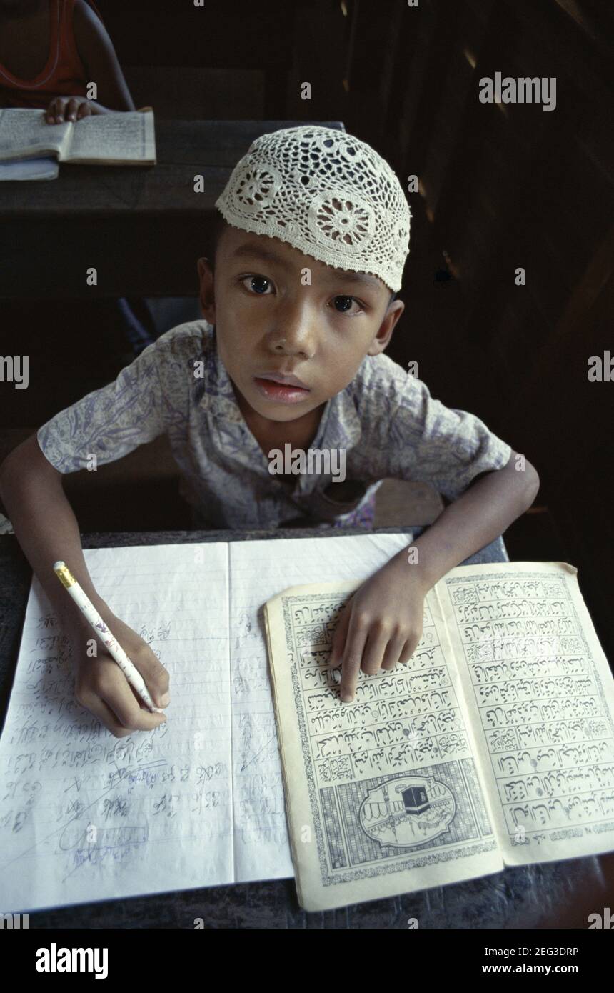 Asia,Malaysia,Kelantan, Kota Bharu, Muslim School Boy Studying the ...