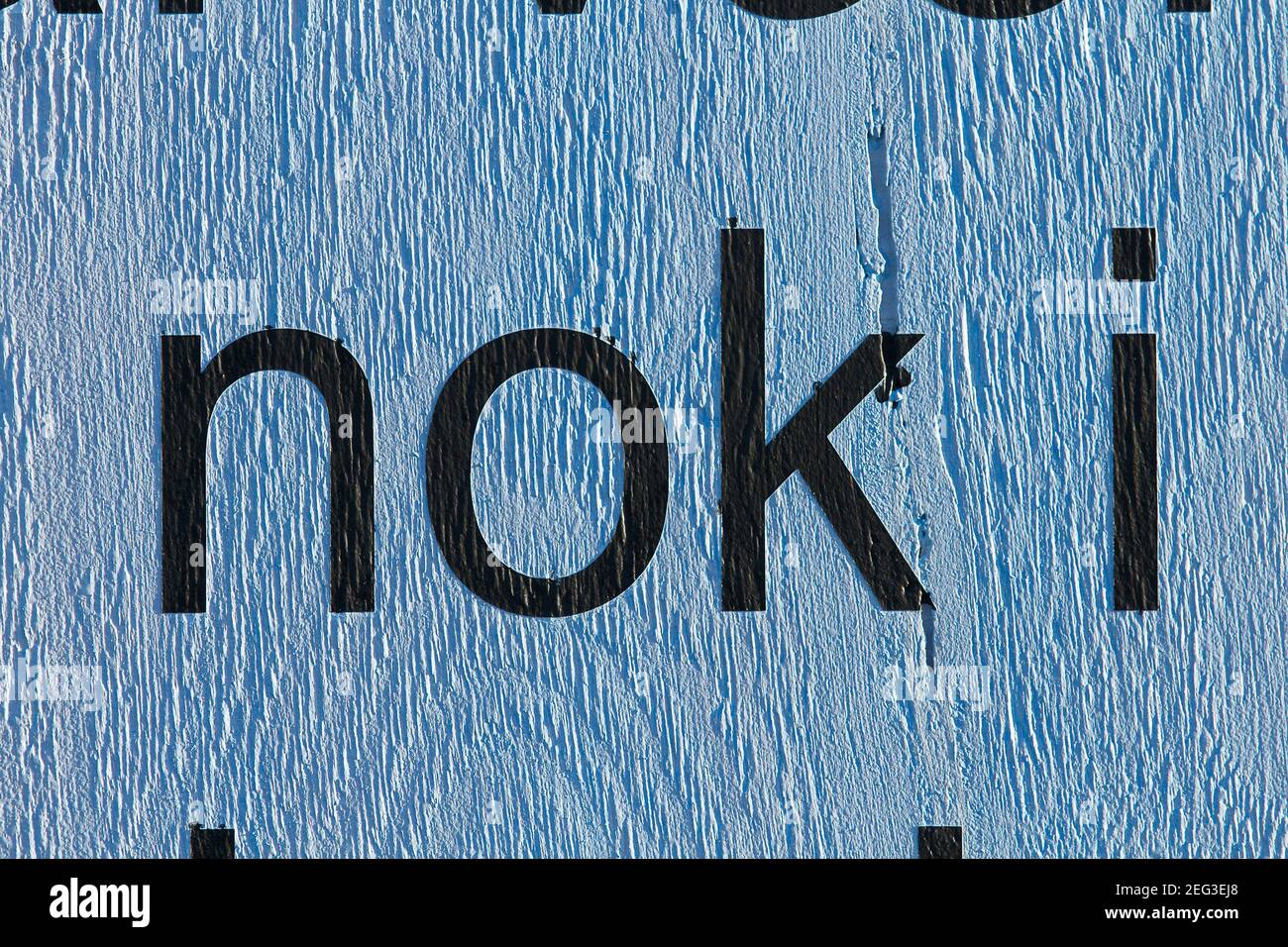 Detail - closeup of a Writing on a blue wall in a village in Denmark ...