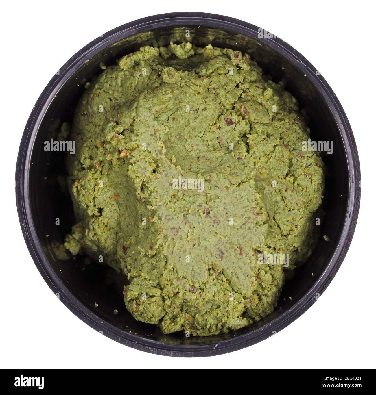 Special green body scrub in black cup, isolated on white background ...