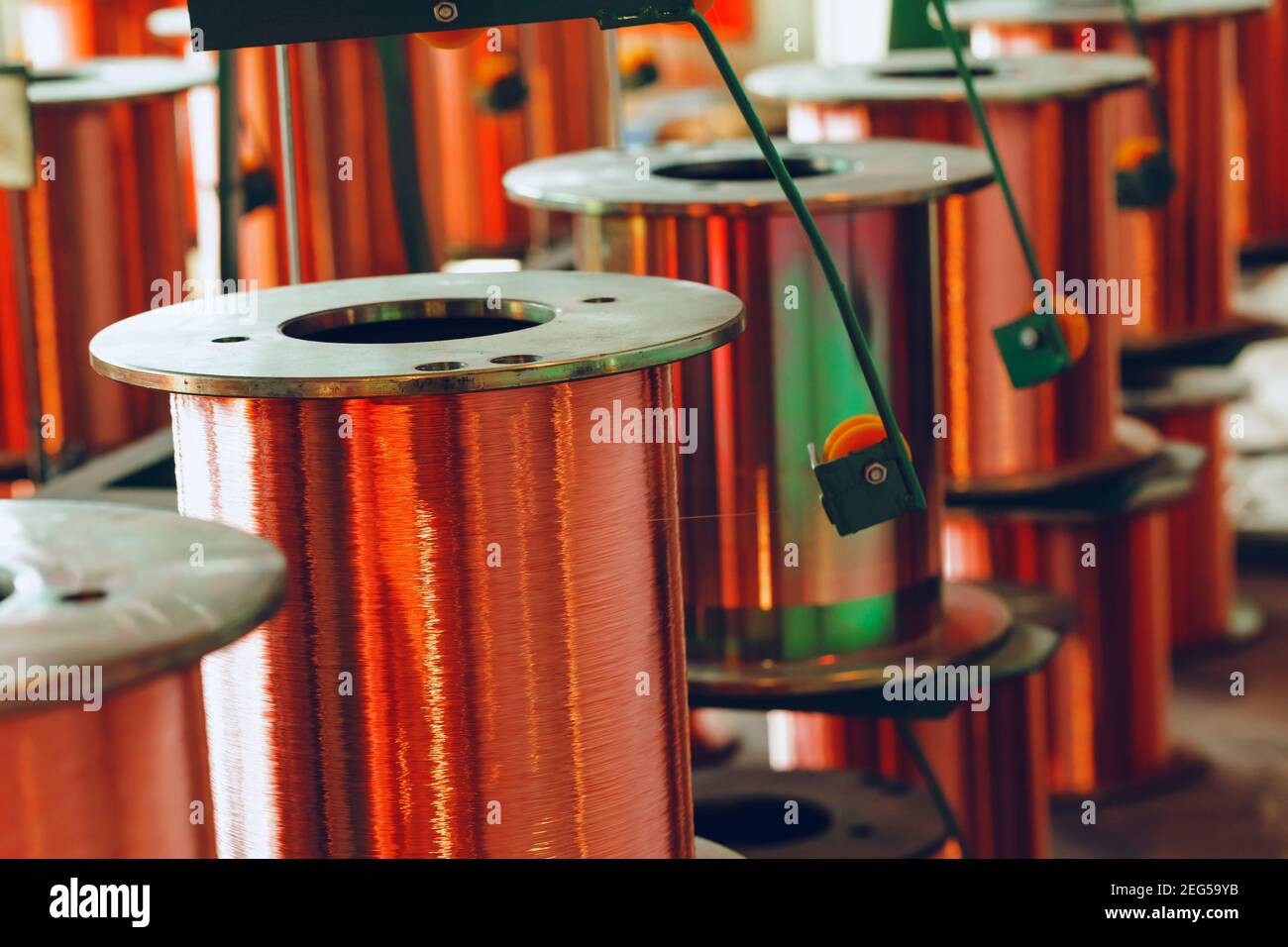 Copper wire reels in cable factory close up Stock Photo - Alamy