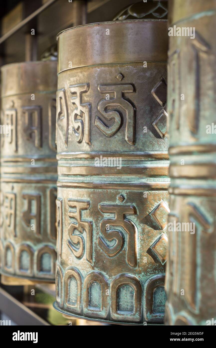 Sanskrit writing on prayer wheels hi-res stock photography and images ...
