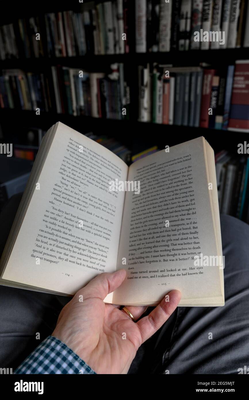 Man holding open book hi-res stock photography and images - Alamy