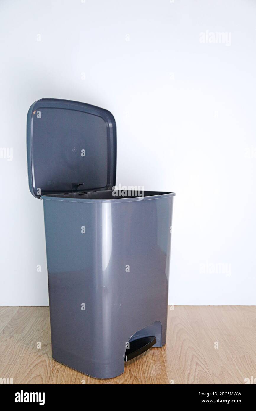 Open garbage can against white background with copy space Stock Photo ...