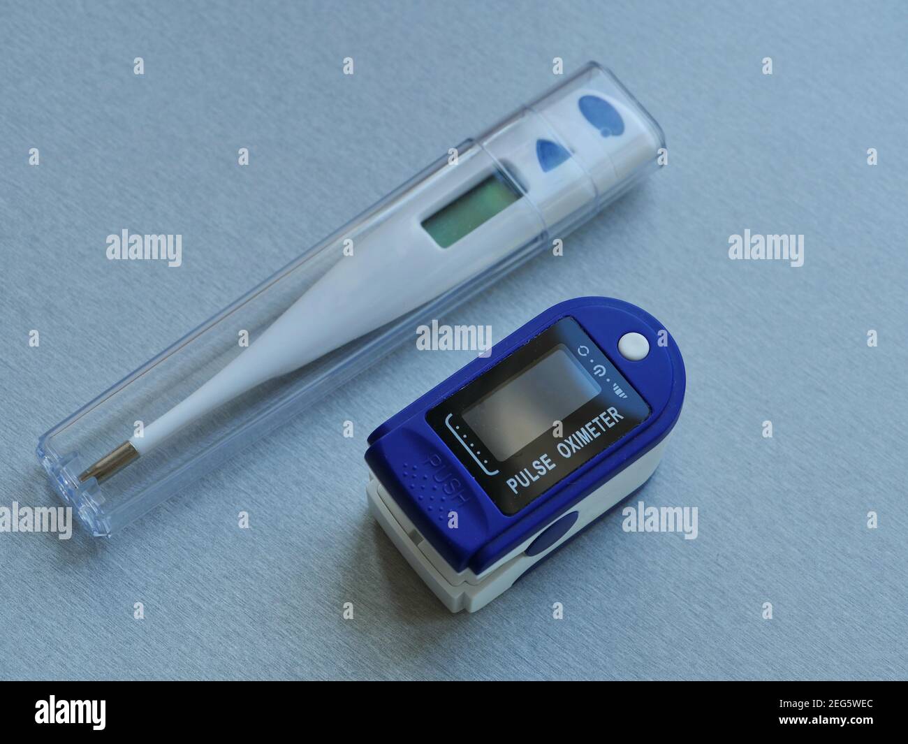 Pulse oximeter electronic thermometer hi-res stock photography and ...