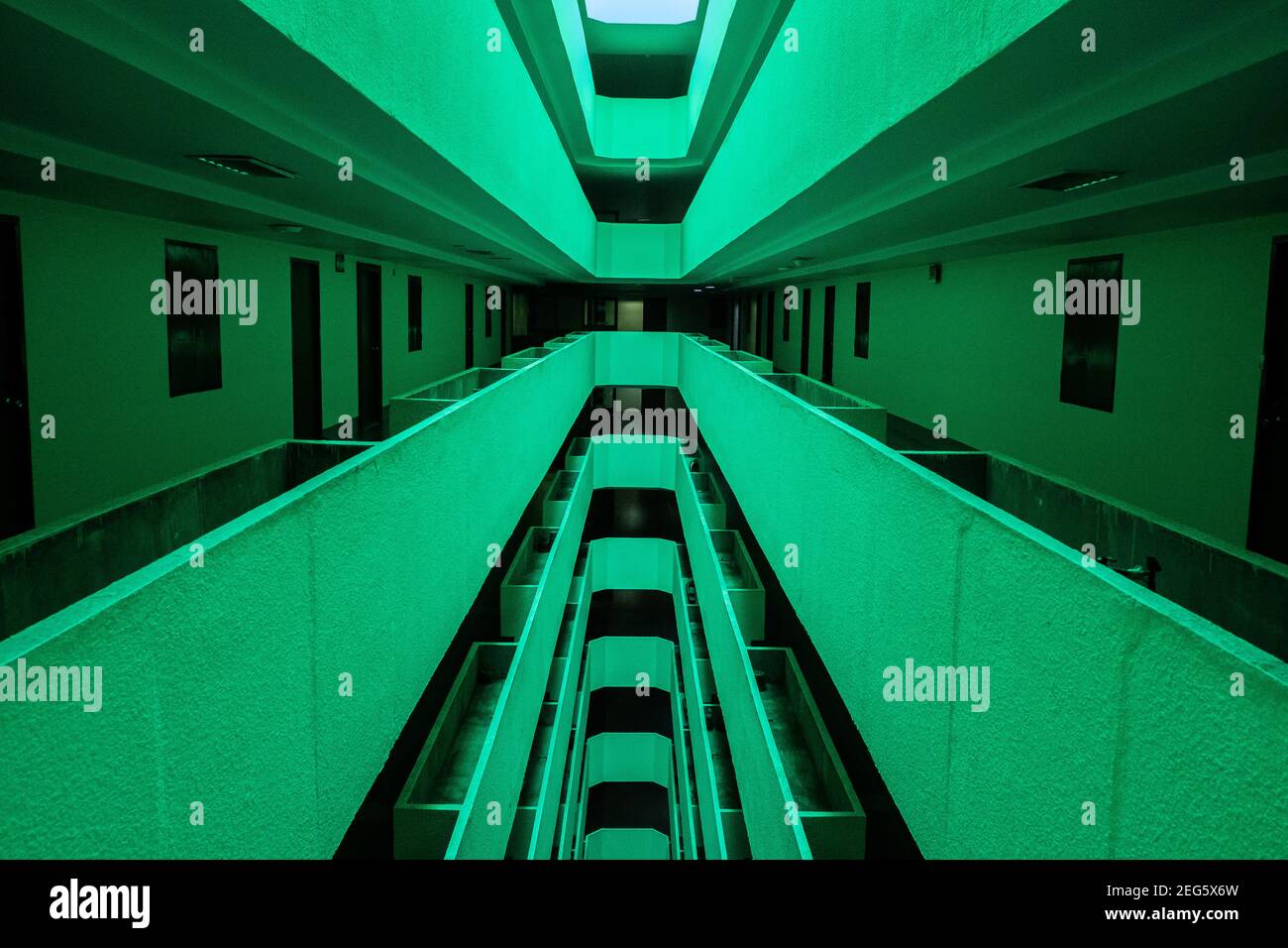 Green light illuminates an apartment building Stock Photo - Alamy