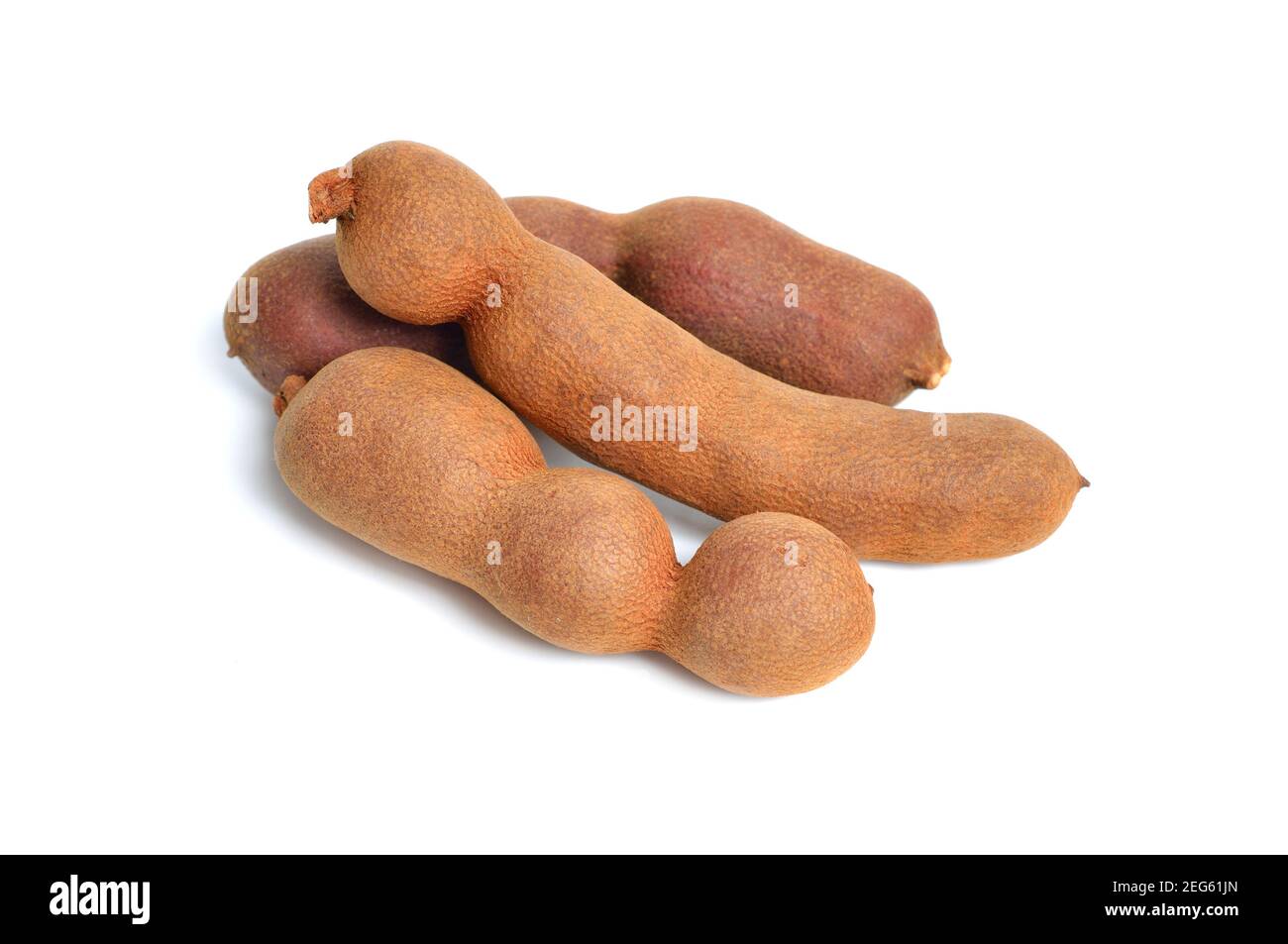 Ripe tamarind fruit isolated on white background Stock Photo - Alamy