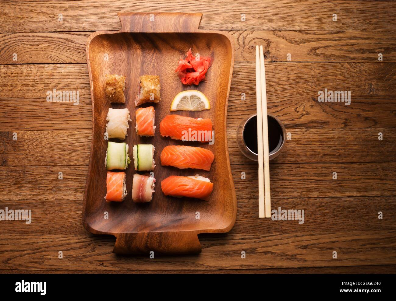Set of sushi and maki roll on stone table. Top view with copy space ...