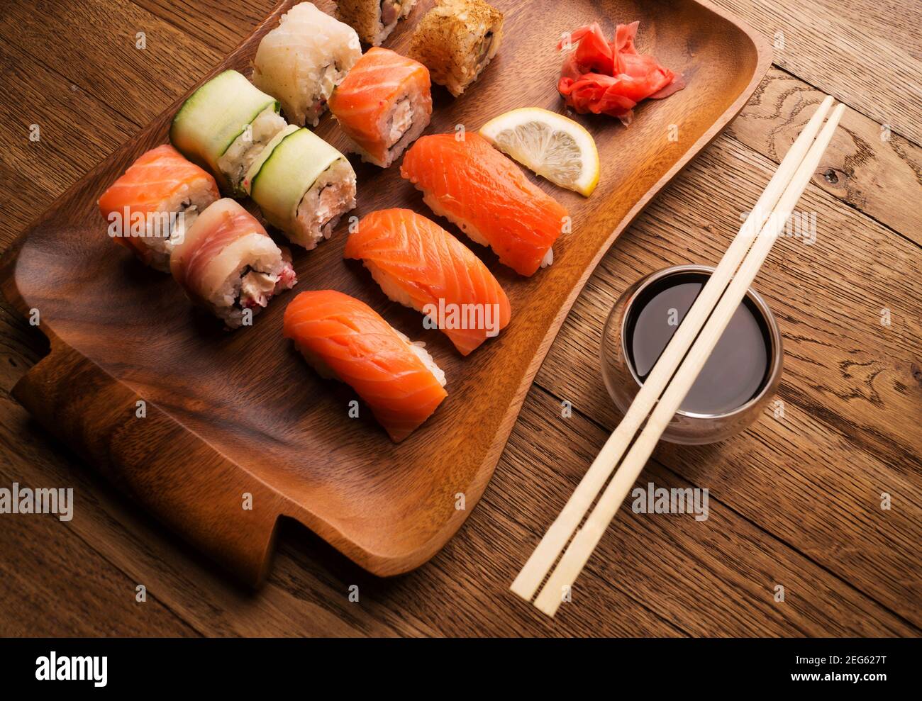 Set of sushi and maki roll on stone table. Top view with copy space ...
