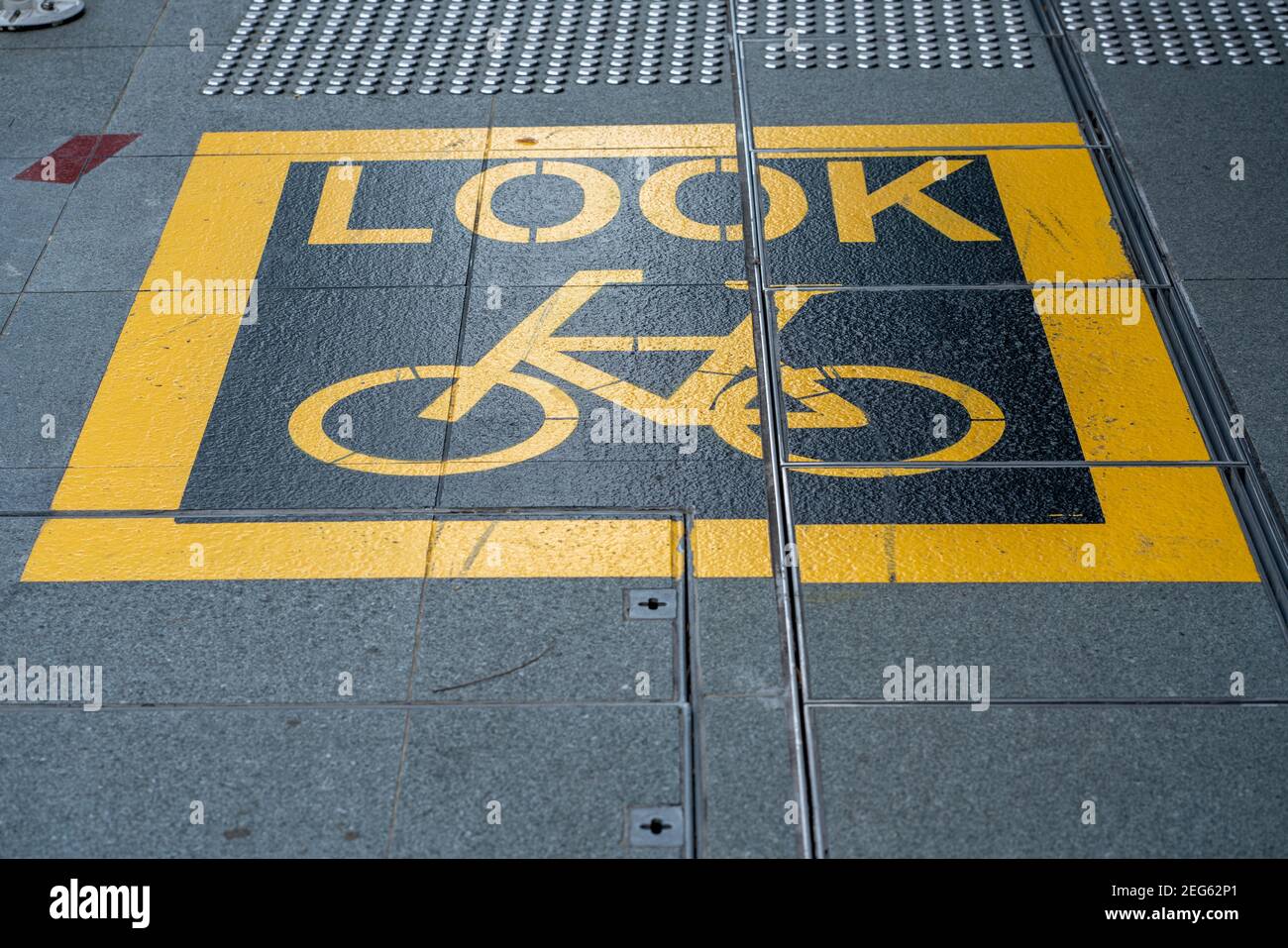 Bicycle traffic sign painted on floor images 'look Stock Photo - Alamy