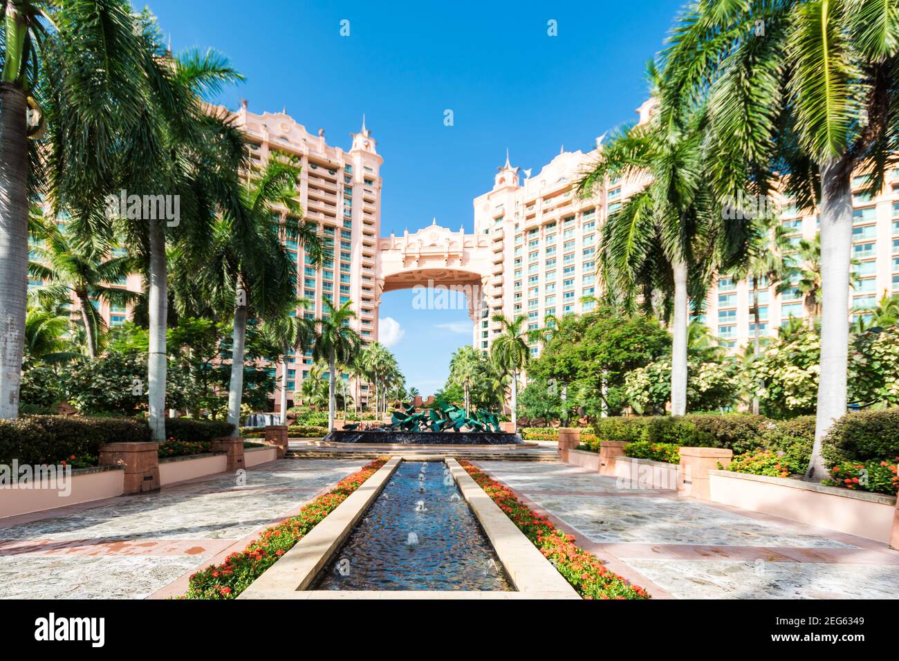 Path in a park leading to a modern high-rise building in the Bahamas ...
