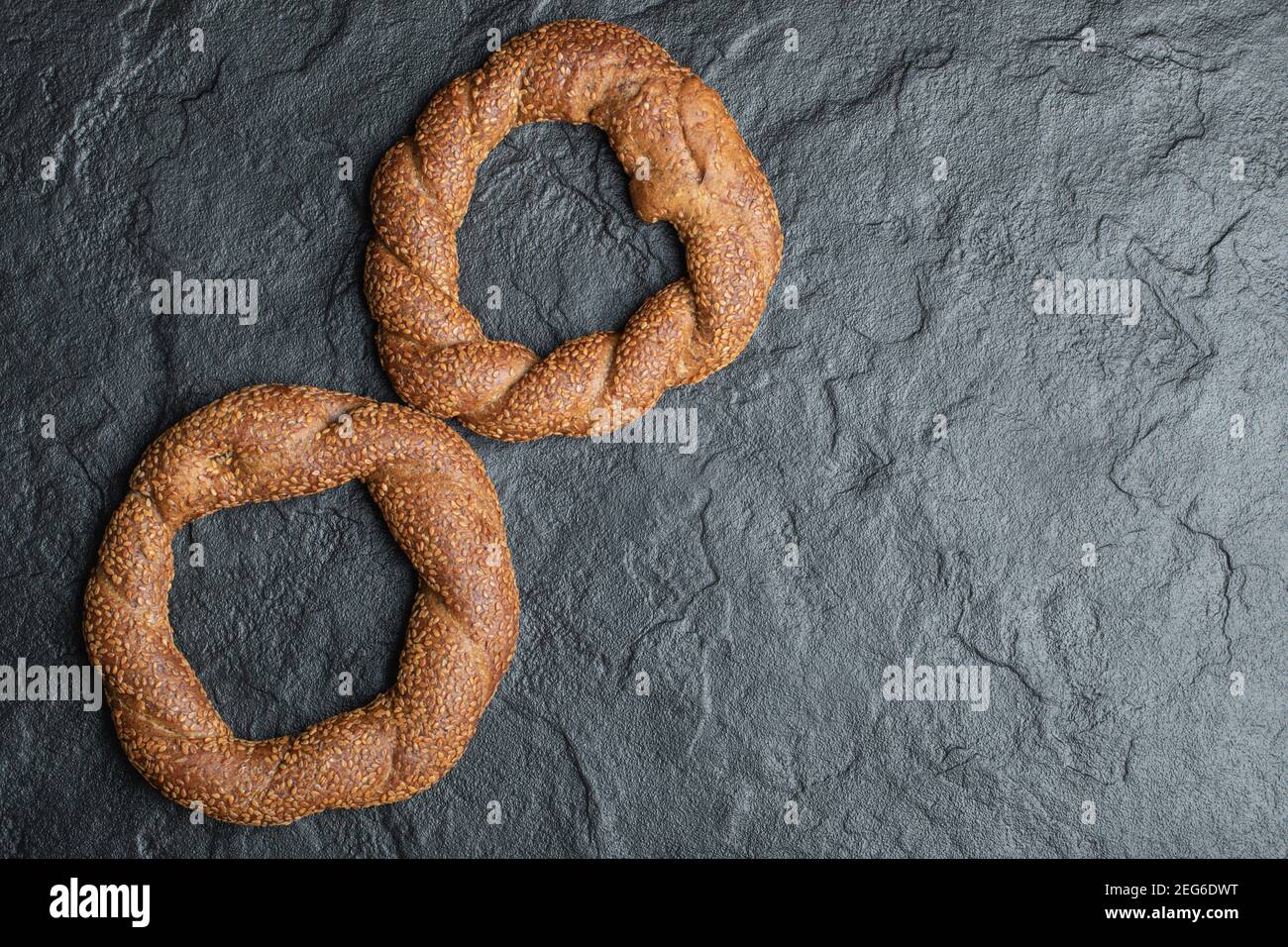 Turkish crunchy round braided bagels with sesame seeds Stock Photo - Alamy