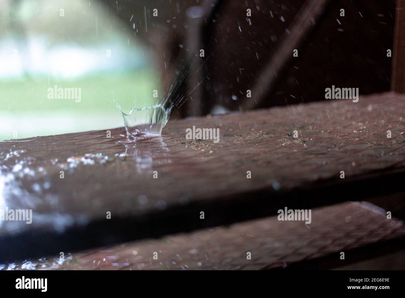 Raindrops dripping on the steps. Brown steps Stock Photo - Alamy