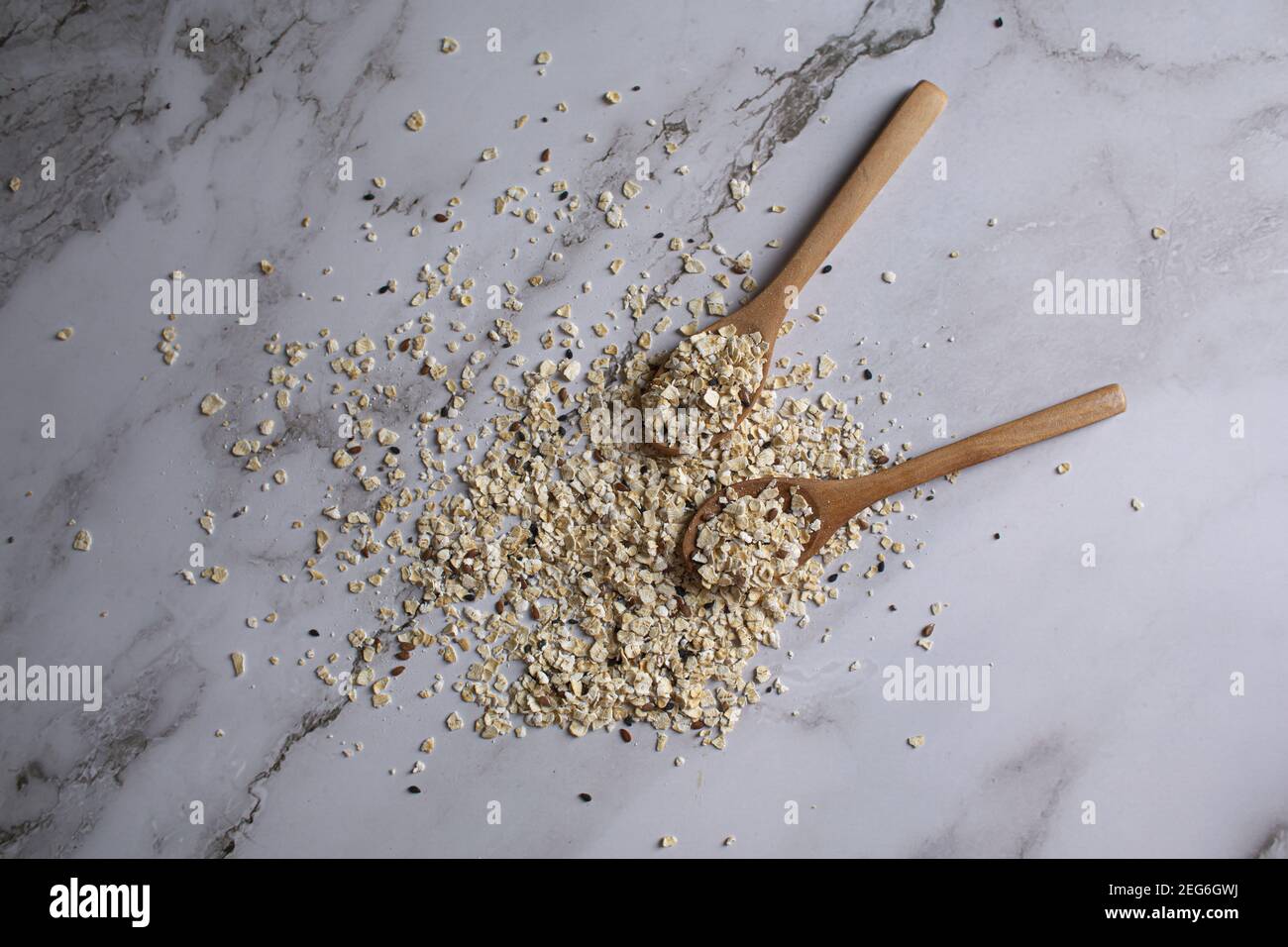 Pile of oat flakes on marble background Stock Photo - Alamy