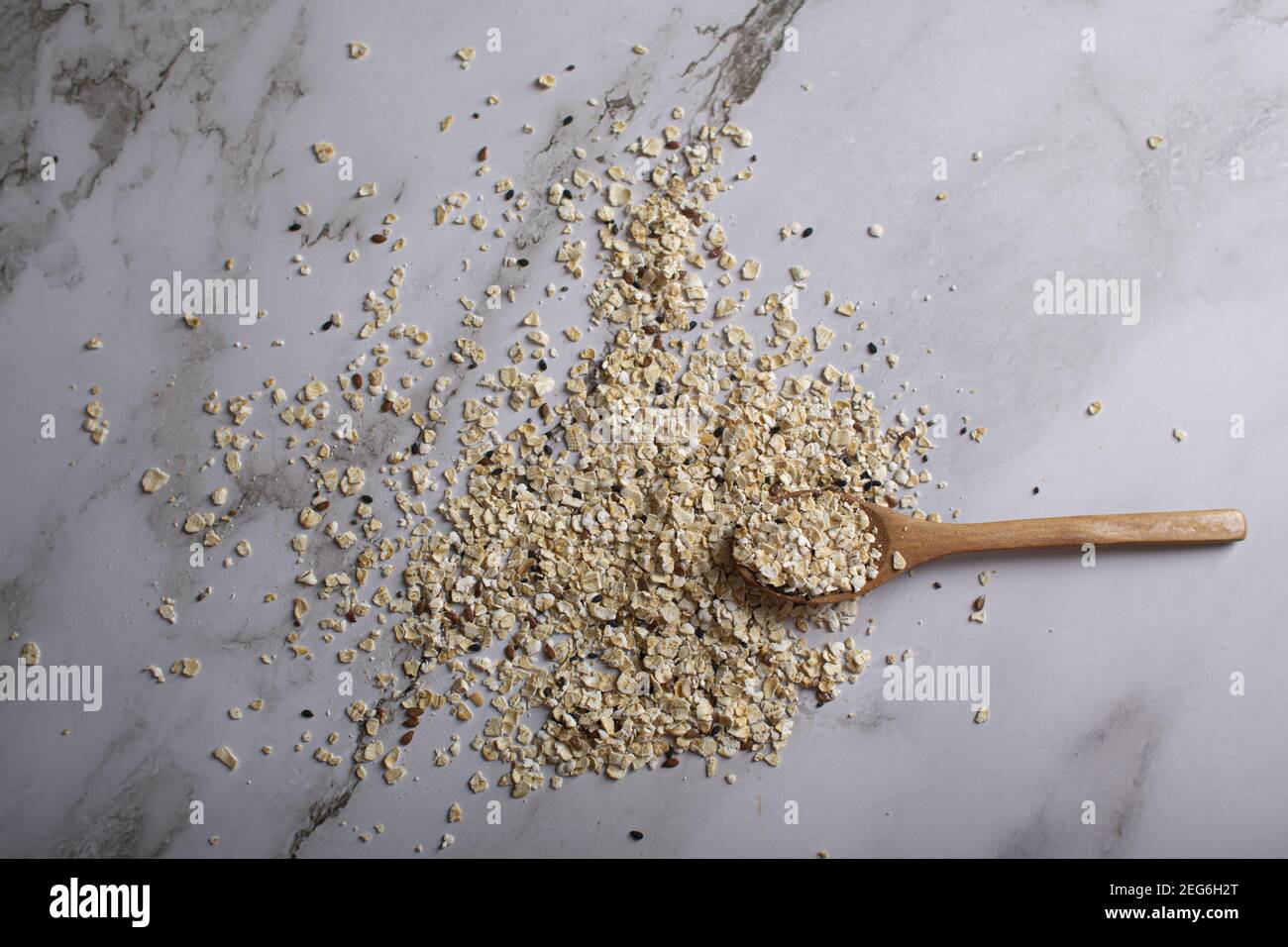 Pile of oat flakes on marble background Stock Photo - Alamy
