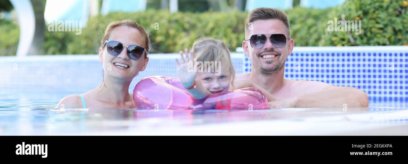 Family holiday pool hotel lounger hi-res stock photography and images ...