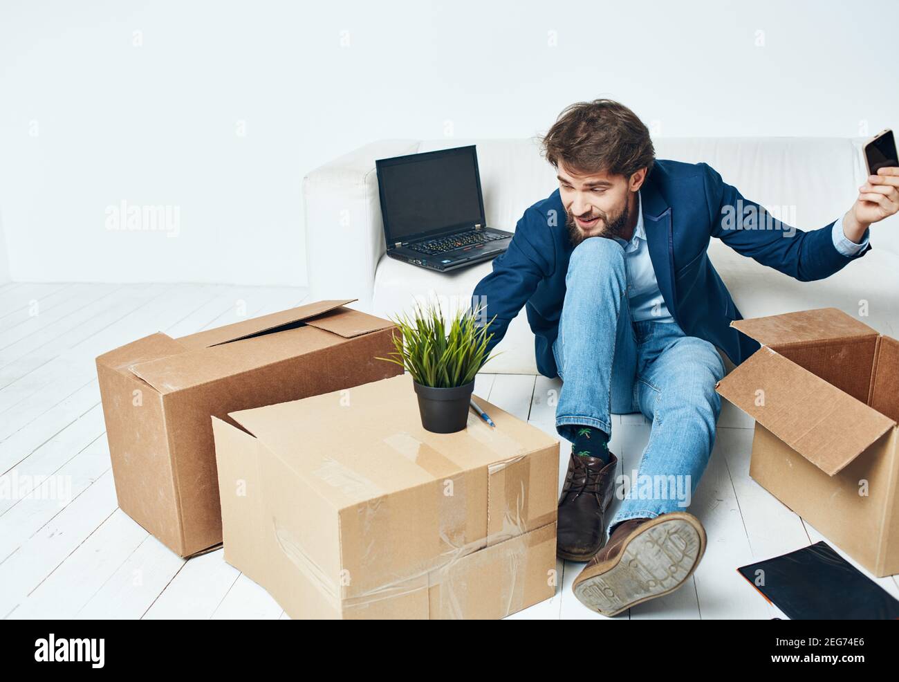 Business man boxes with things laptop office unpacking work Stock Photo ...