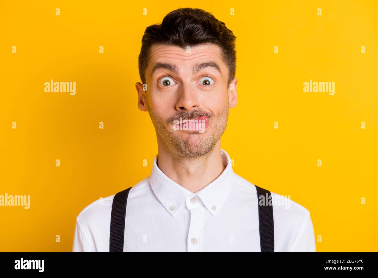 Photo portrait of young student fooling grimacing showing tongue silly ...