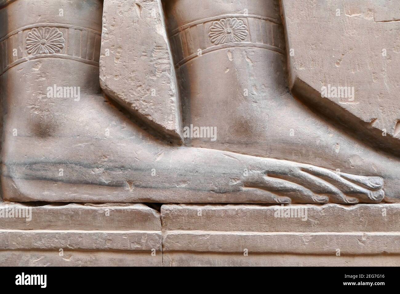 Closeup of Egyptian's feet - a relief on the wall of the Temple of Edfu ...