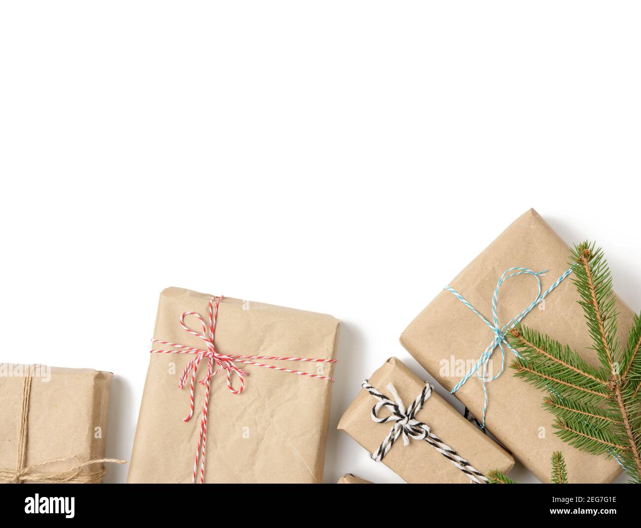 box wrapped in brown kraft paper and tied with rope, gift on white ...