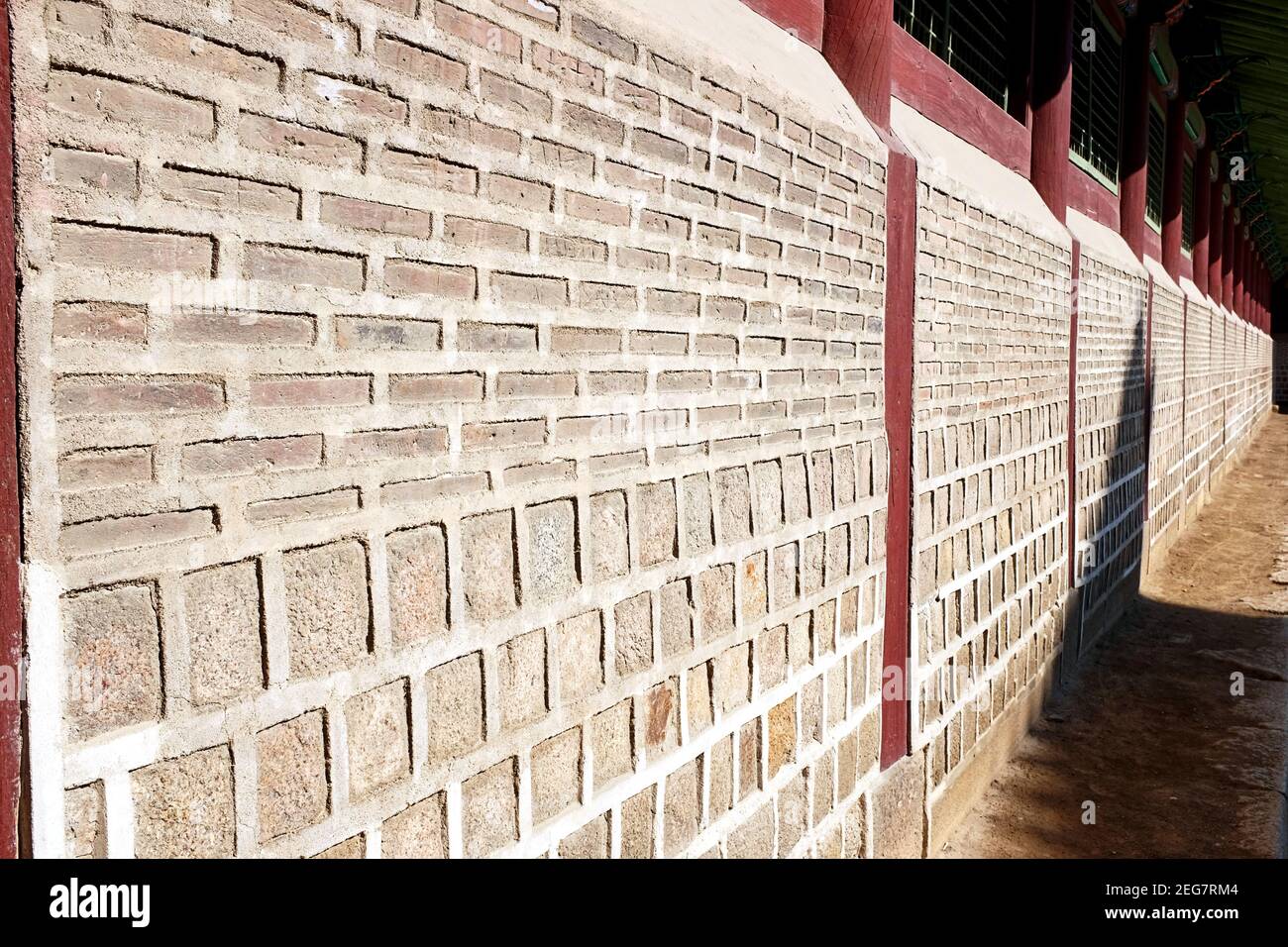 Ancient brick wall extending into the distance. Horizontal composition ...