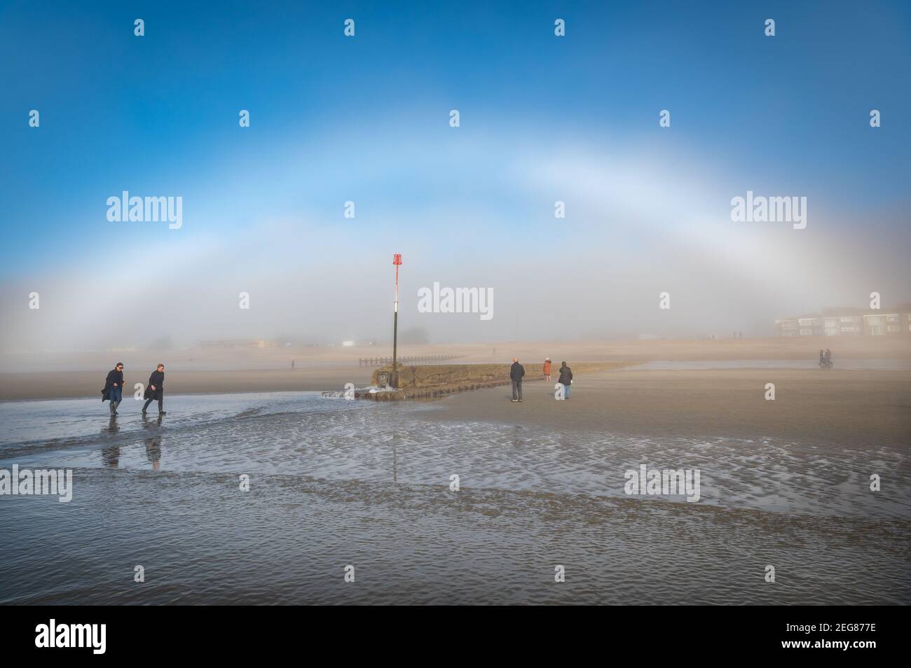 Fogbow, a colourless rainbow appears in the sky on a foggy day on the ...