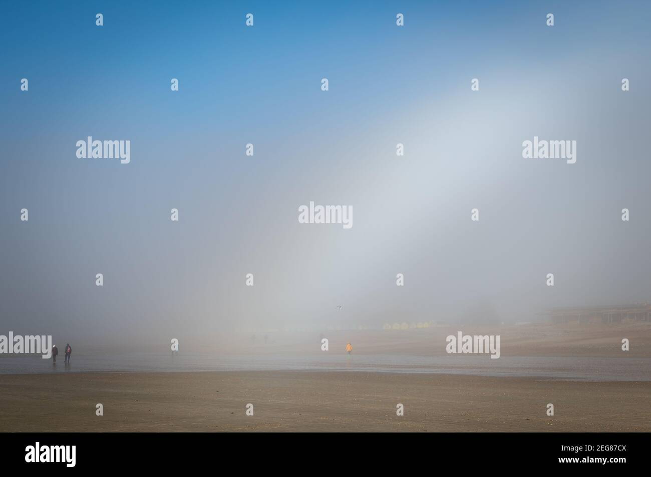 Fogbow, a colourless rainbow appears in the sky on a foggy day on the ...