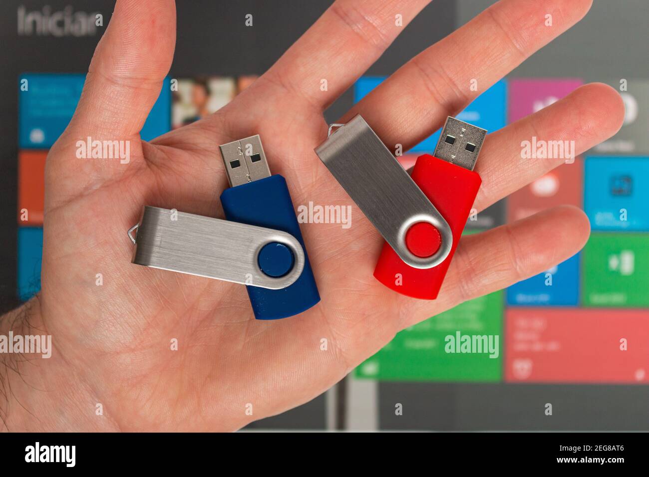 Top view of two USB flash drives on a hand Stock Photo - Alamy