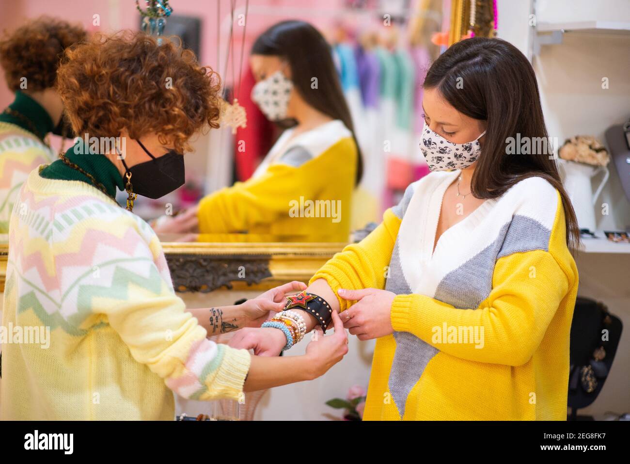 Women trying on shoes accessories hi-res stock photography and images ...