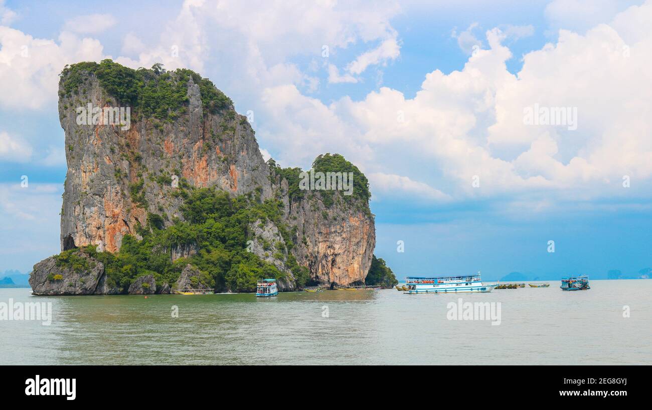Beautiful view of the giant rocky cliff on the ocean under the cloudy ...