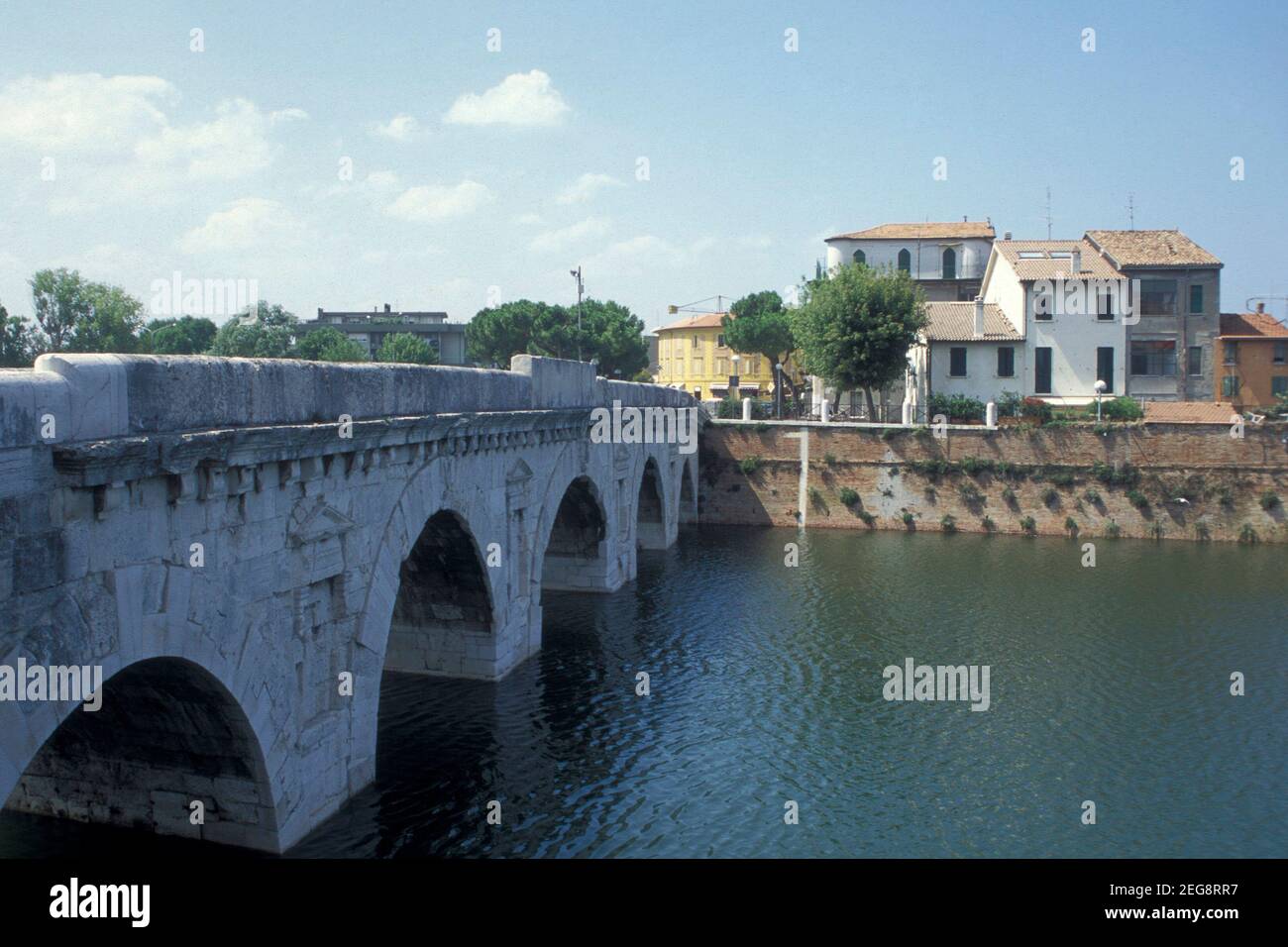 the Ponte di Tiberio in th old town of Rimini in Emilia-Romagna in ...