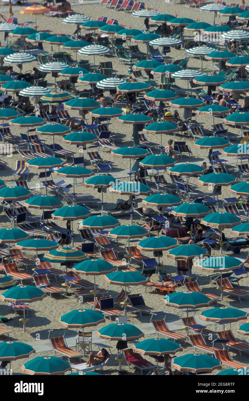 umbrellas or parasol at a public beach in Rimini in Emilia-Romagna in ...