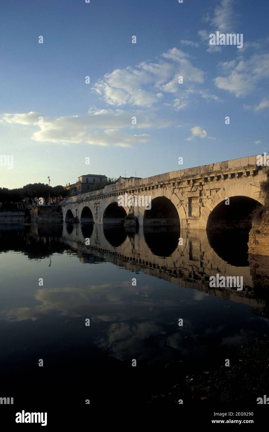 the Ponte di Tiberio in th old town of Rimini in Emilia-Romagna in ...