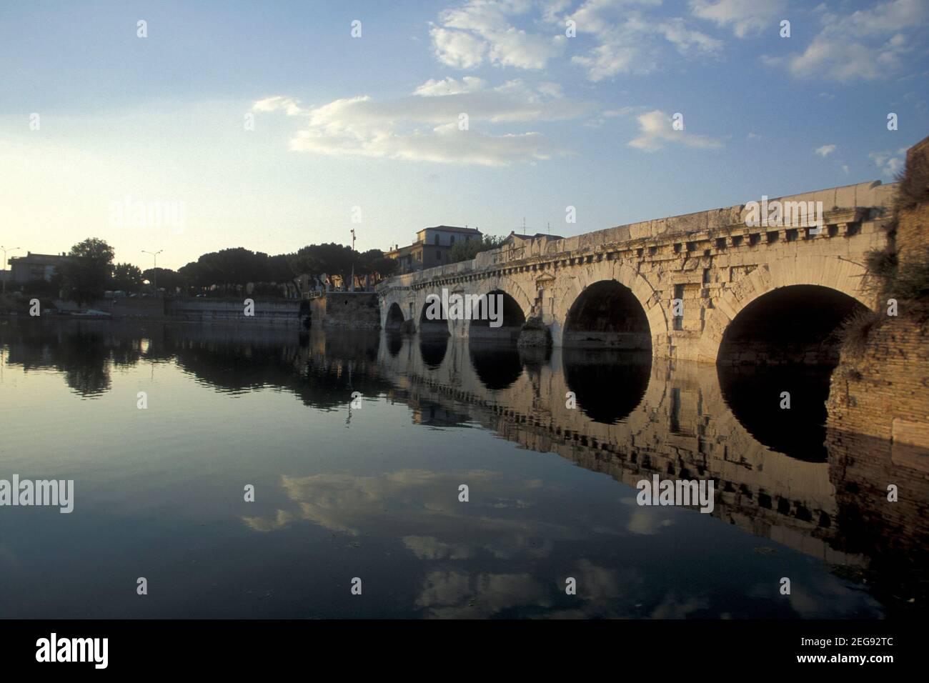 the Ponte di Tiberio in th old town of Rimini in Emilia-Romagna in ...