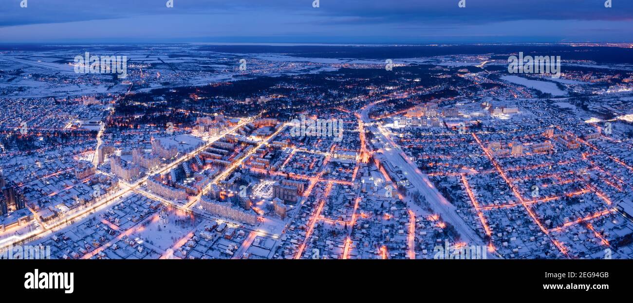 Low-rise suburban buildings, drone view. Night winter cityscape Stock ...