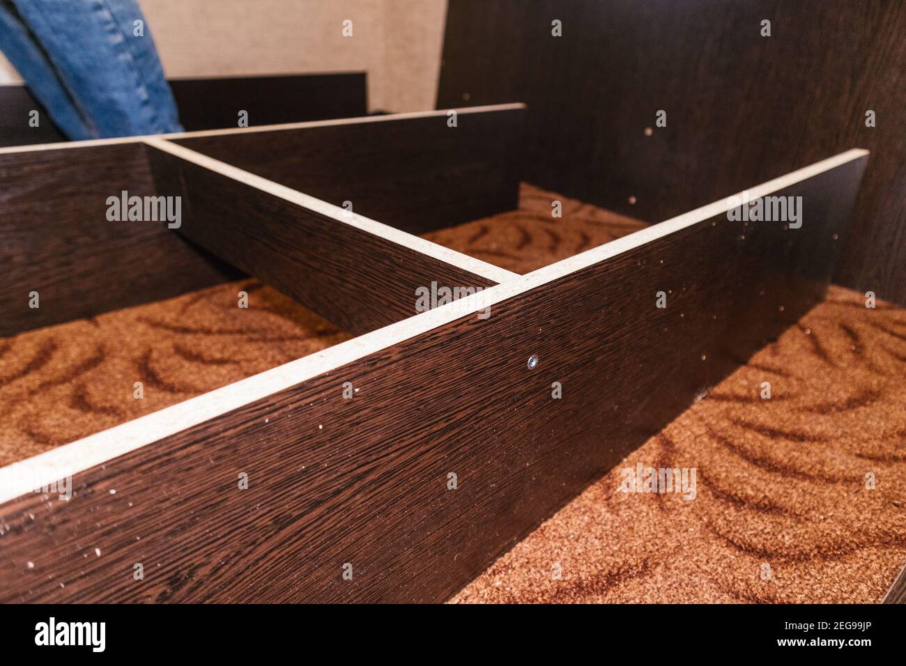 spinning bolts master worker man assembling furniture bed components ...